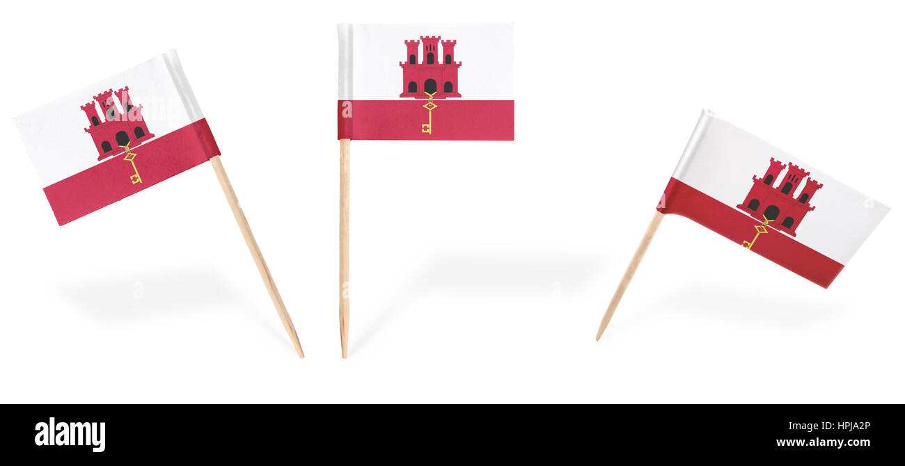 Small cocktail flags of Gibraltar in different positions isolated on ...