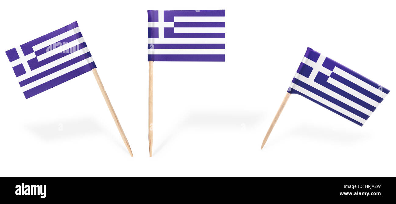 Small cocktail flags of Greece in different positions isolated on white ...