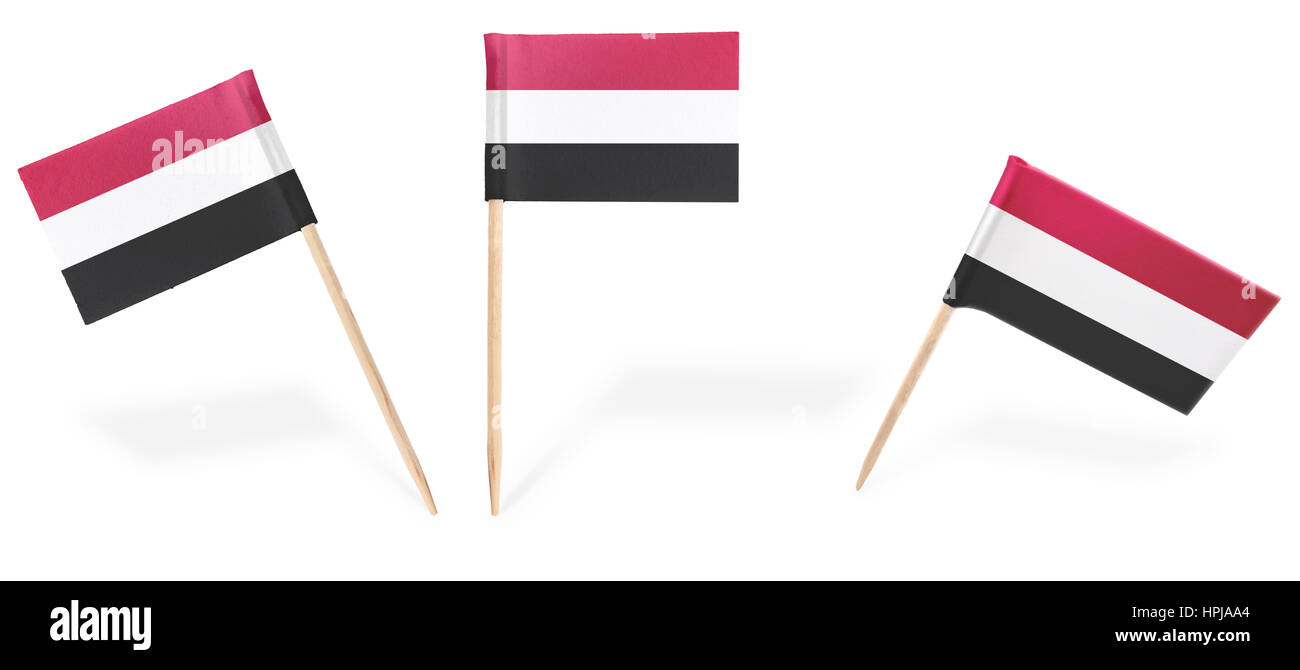 Small cocktail flags of Yemen in different positions isolated on white ...