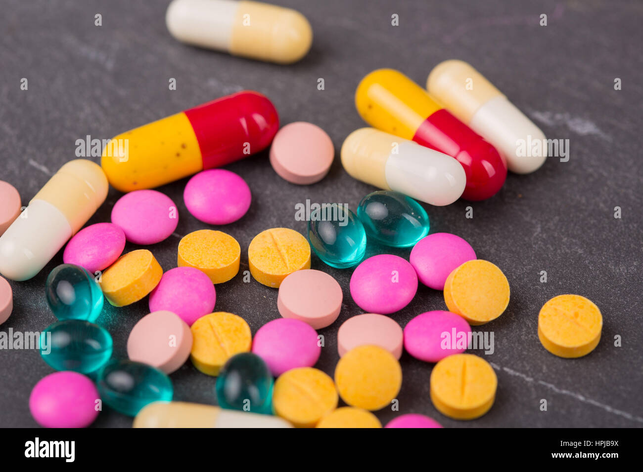 different tablets pills capsule heap mix therapy drugs Stock Photo - Alamy