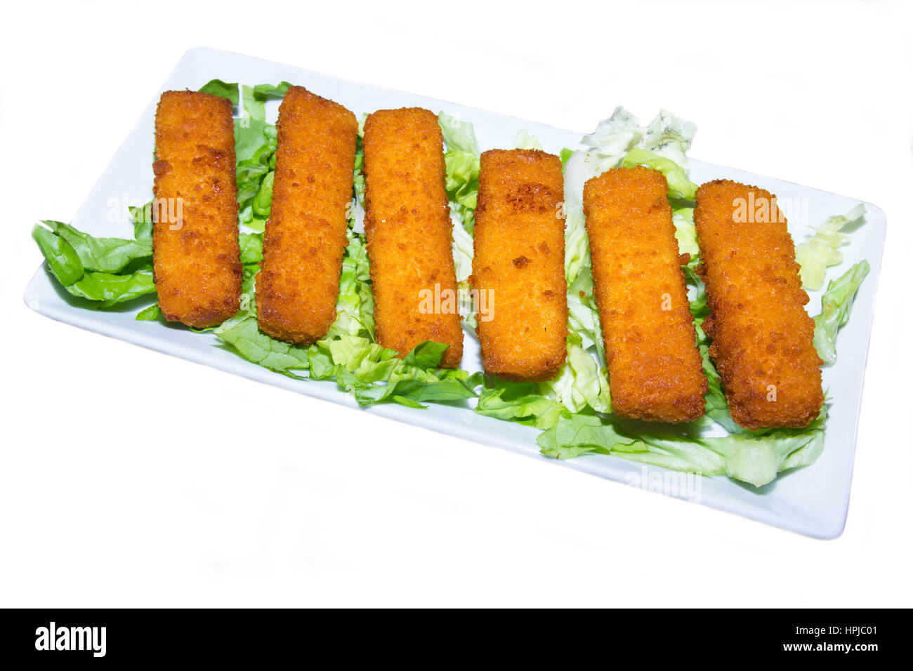 Fish sticks on tray on a white background seen from above Stock Photo ...