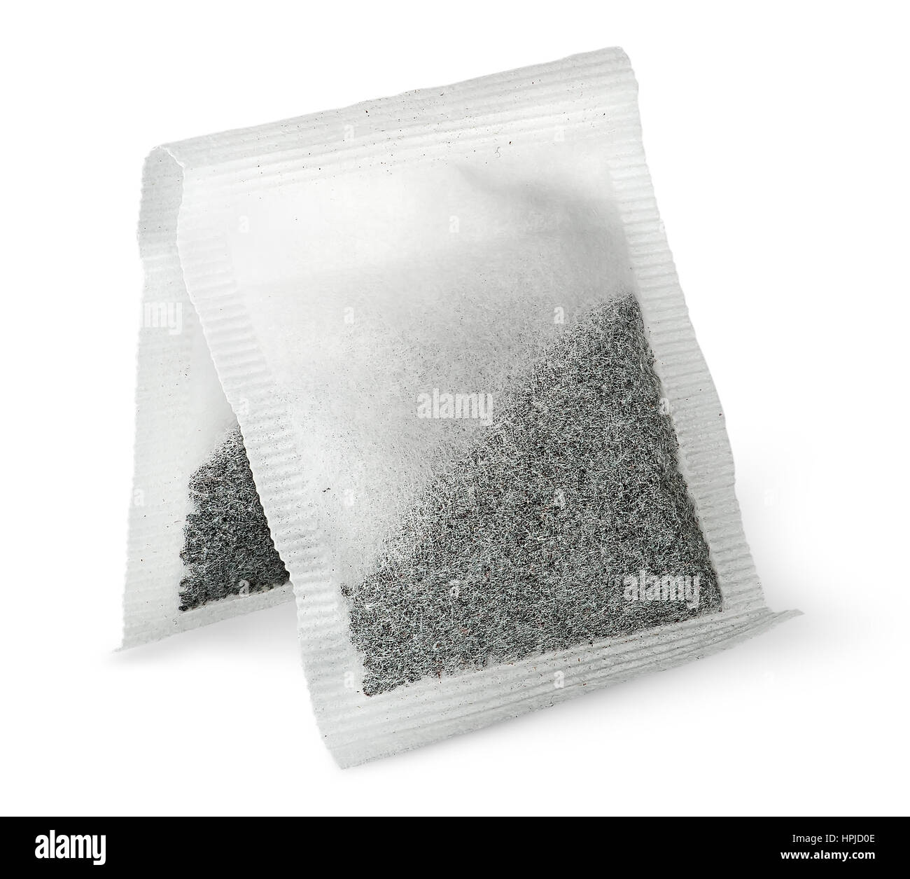 Dual tea bag vertically isolated on white background Stock Photo - Alamy