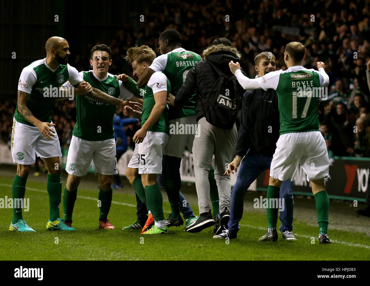 Hibernian fans invade the pitch after Jason Cummings scored his side's ...