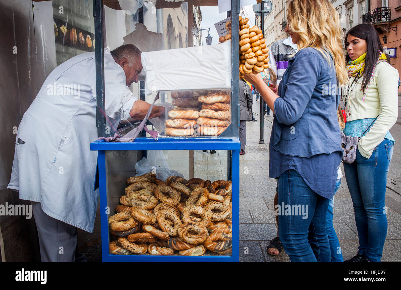 Selling pretzels obwarzanki traditional Krakowian bread, at Grodzka ...