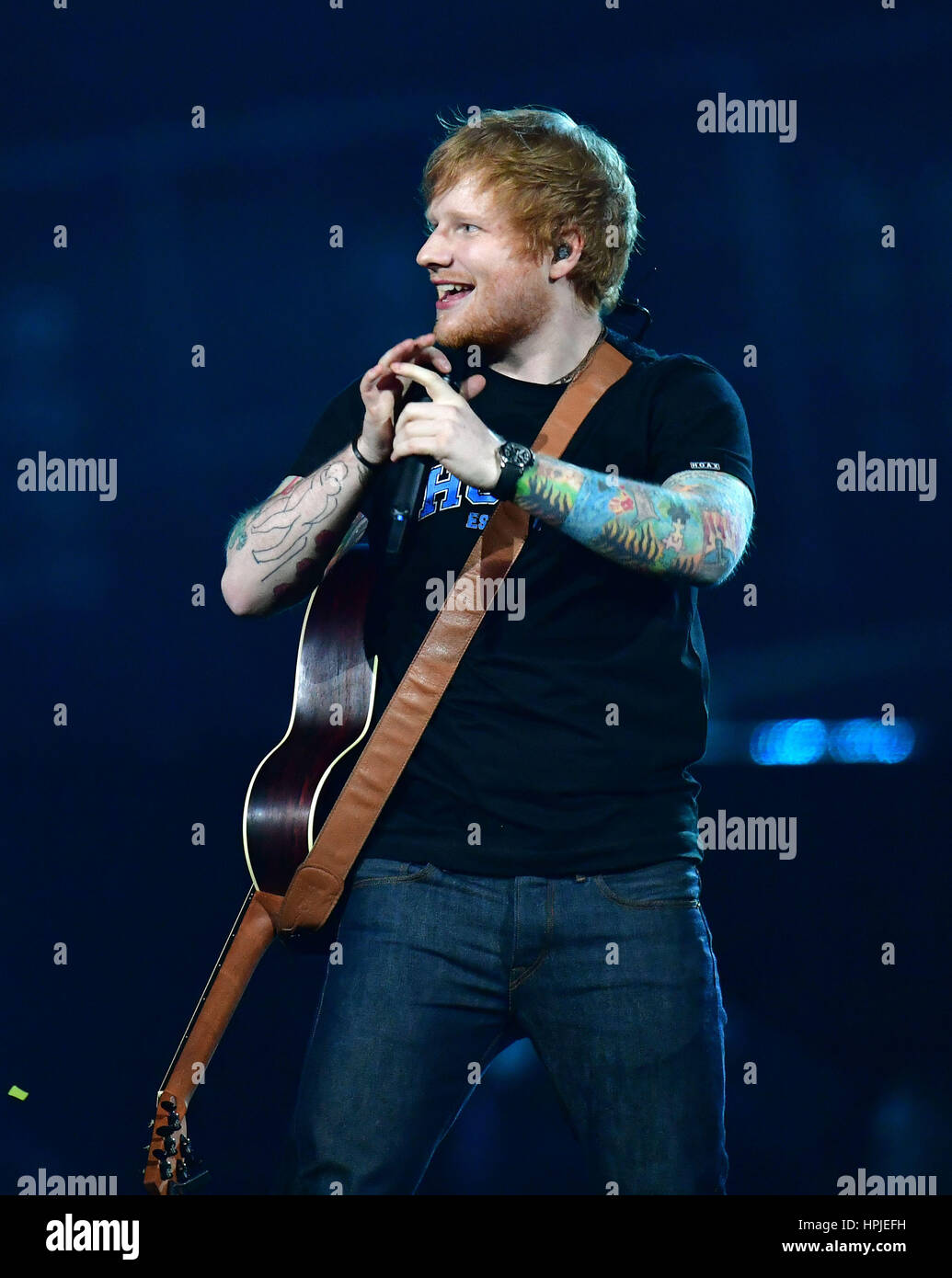 Ed Sheeran performing on stage at the Brit Awards at the O2 Arena ...