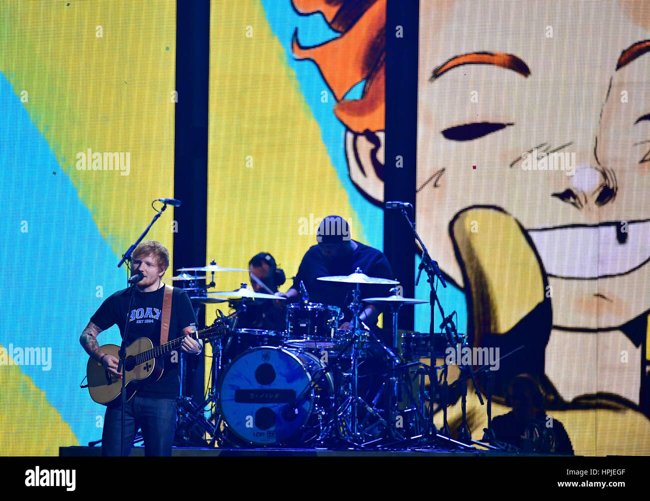 Ed Sheeran performing on stage at the Brit Awards at the O2 Arena ...