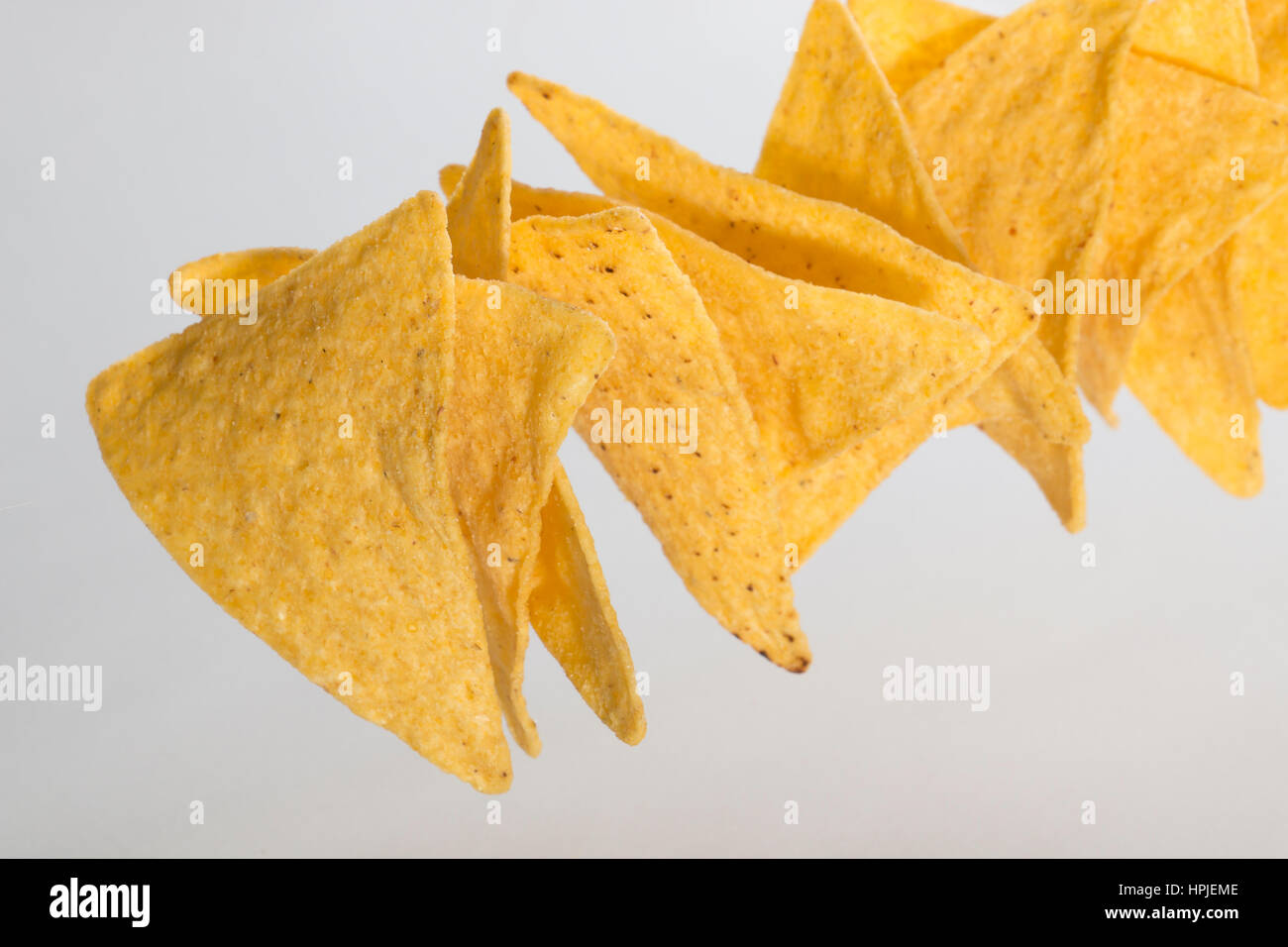 Tortilla chips in a row Stock Photo - Alamy