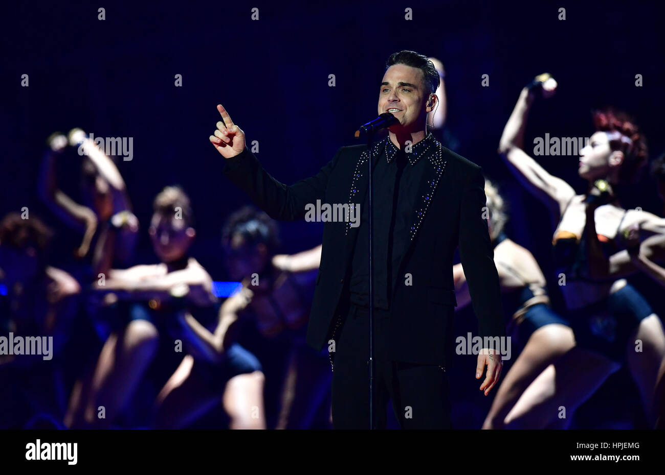 Robbie Williams performs on stage at the Brit Awards at the O2 Arena ...