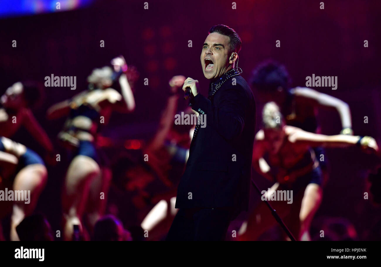 Robbie Williams performs on stage at the Brit Awards at the O2 Arena ...