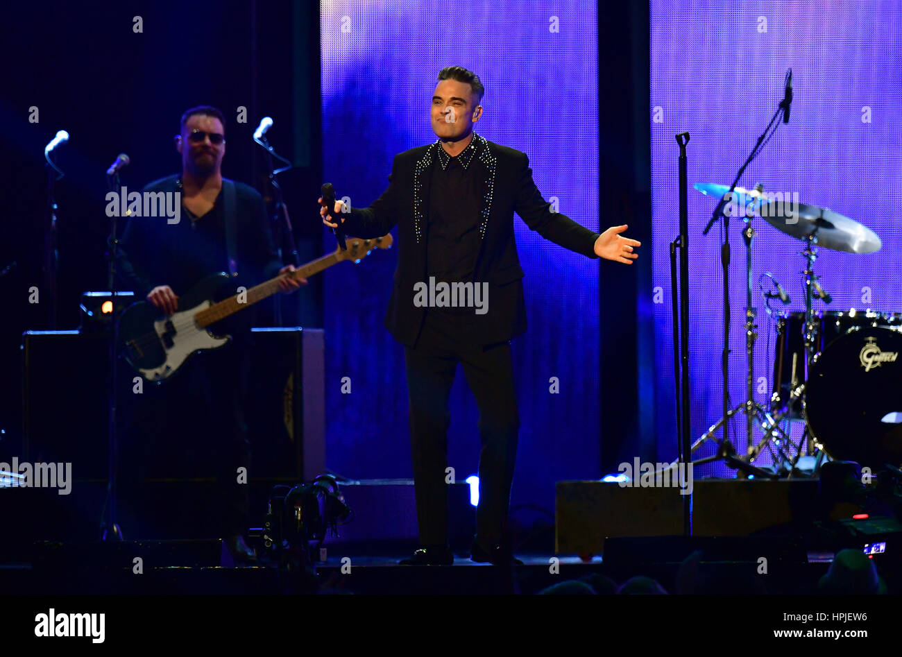 Robbie Williams performs on stage at the Brit Awards at the O2 Arena ...