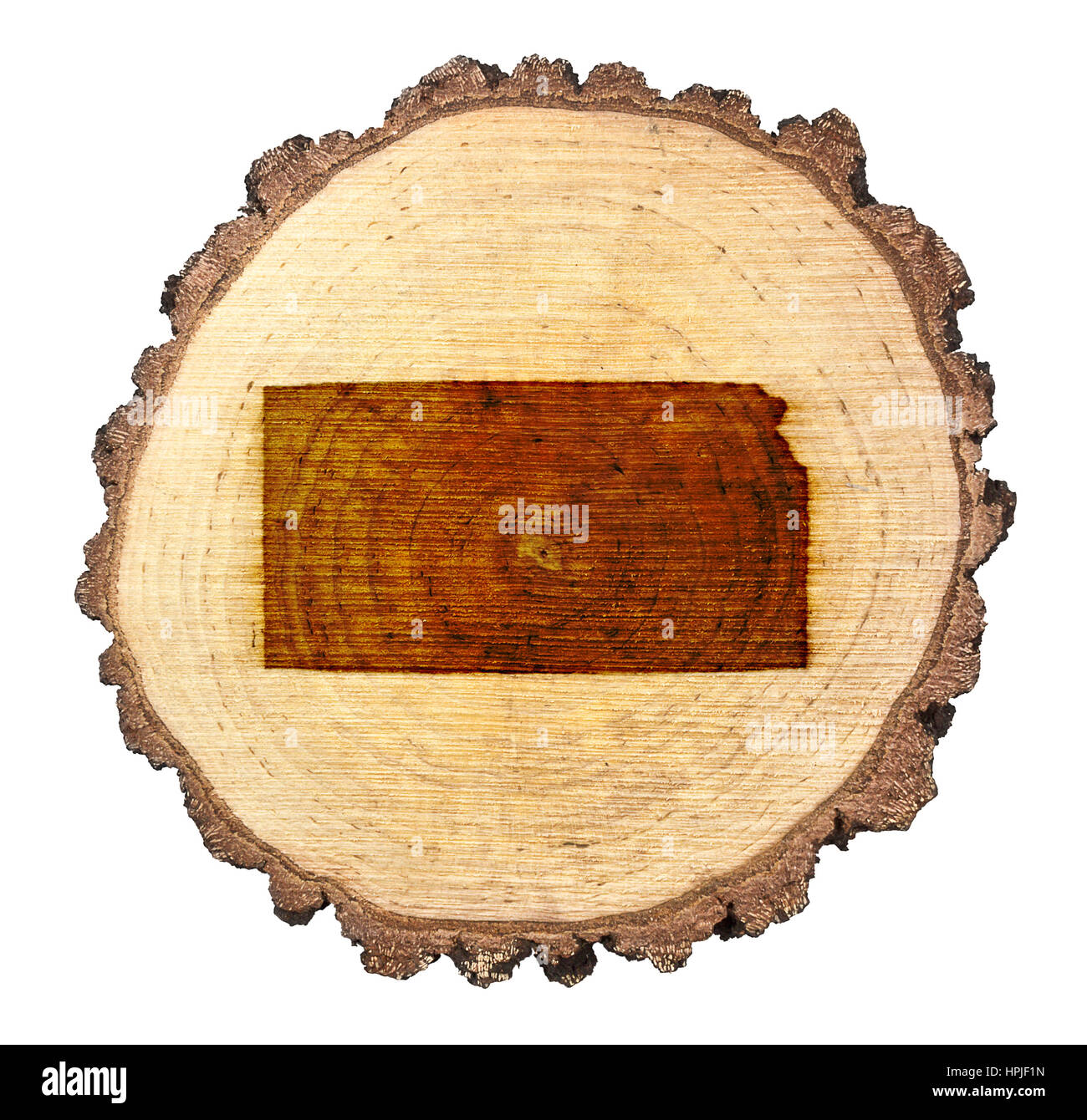 A slice of oak and the shape of Kansas branded onto .(series Stock ...