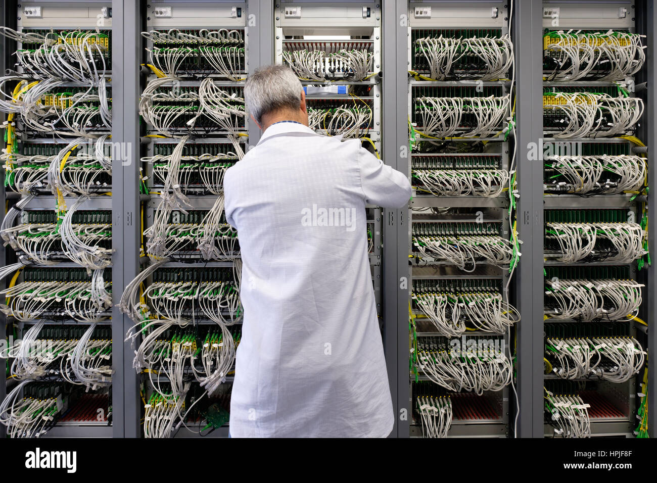 Data center technician working in the server room Stock Photo - Alamy Data center technician working in the server room Stock Photo - Alamy