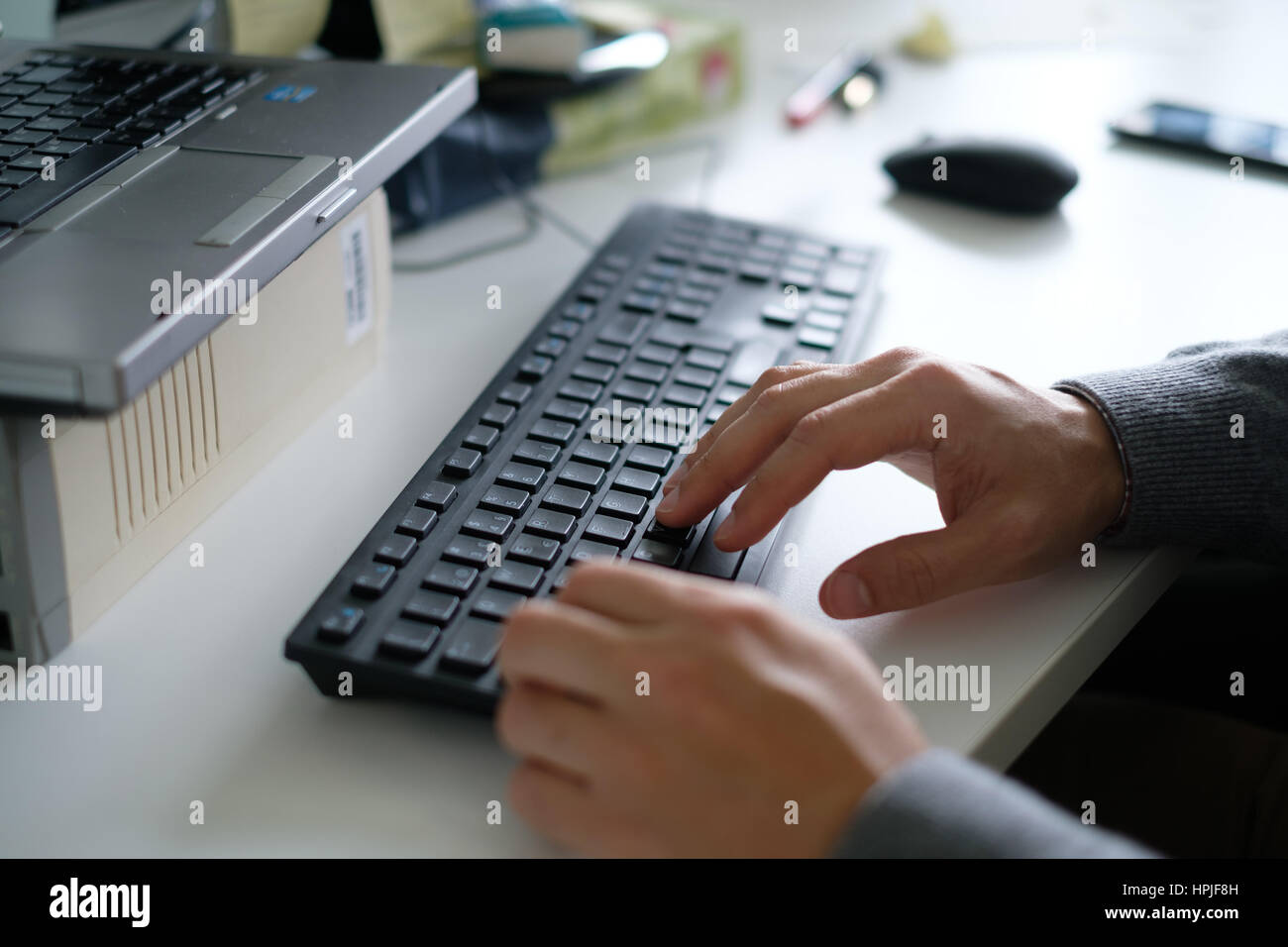 Hand man typing hi-res stock photography and images - Alamy