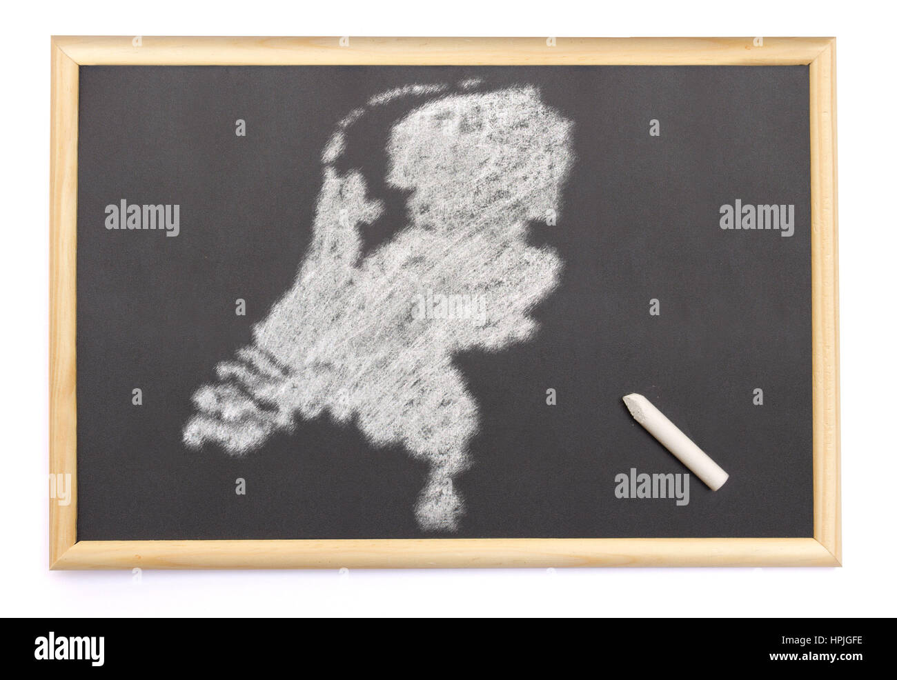 Blackboard with a chalk and the shape of Netherlands drawn onto ...