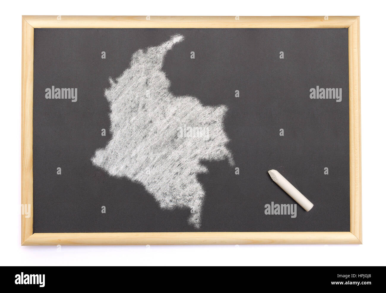 Blackboard with a chalk and the shape of Colombia drawn onto. (series ...