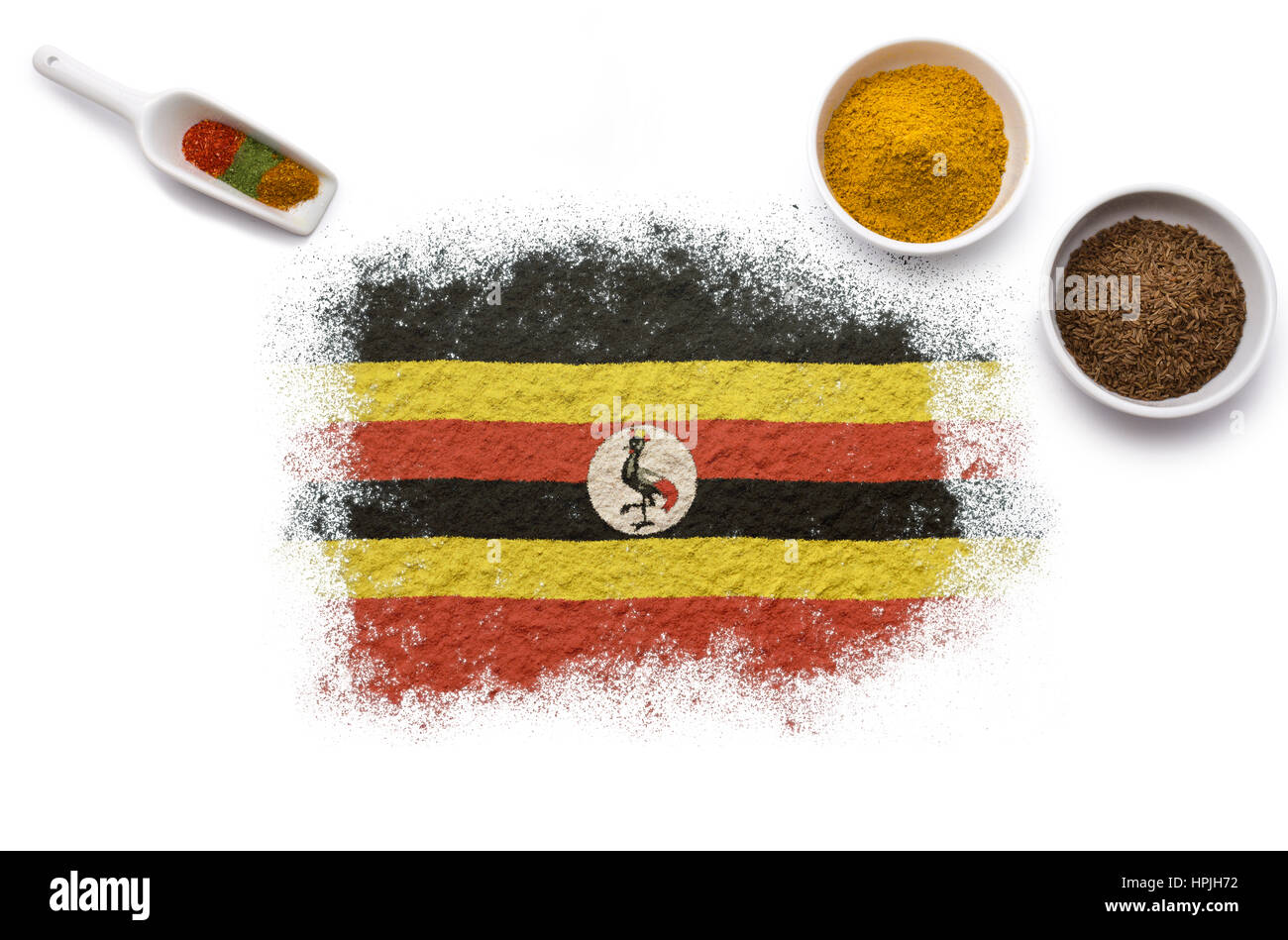 Various spices forming the flag of Uganda.(series Stock Photo - Alamy