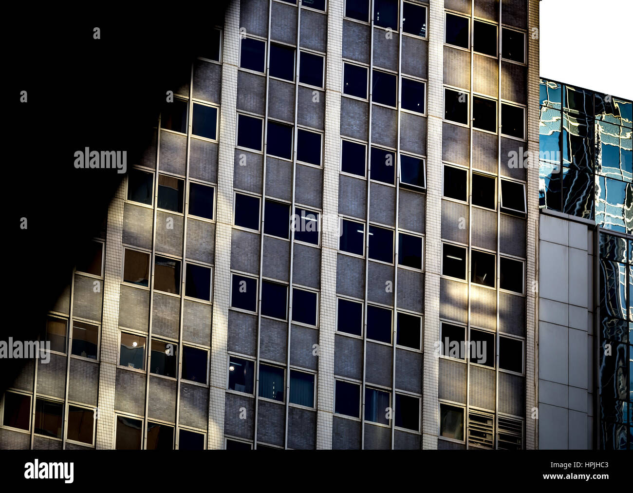 windows of commercial building in Hong Kong Stock Photo - Alamy