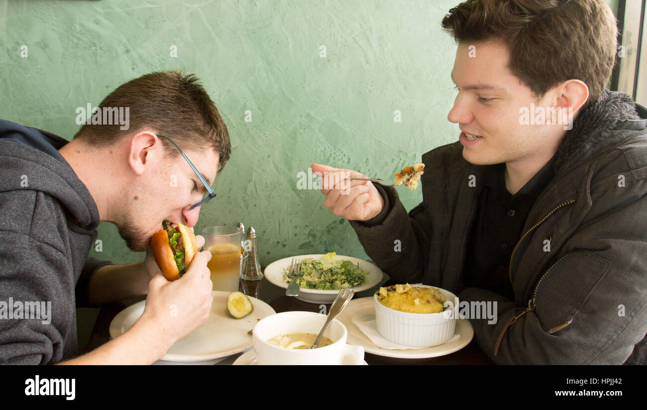 Family eating together restaurant hi-res stock photography and images ...