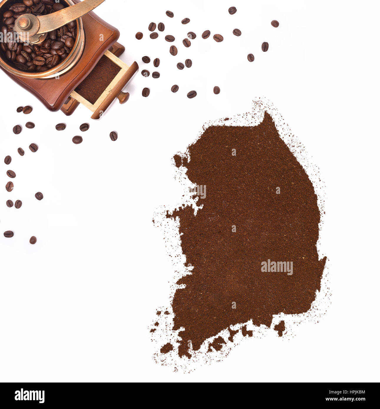 Coffee powder in the shape of South Korea and a decorative coffee mill ...