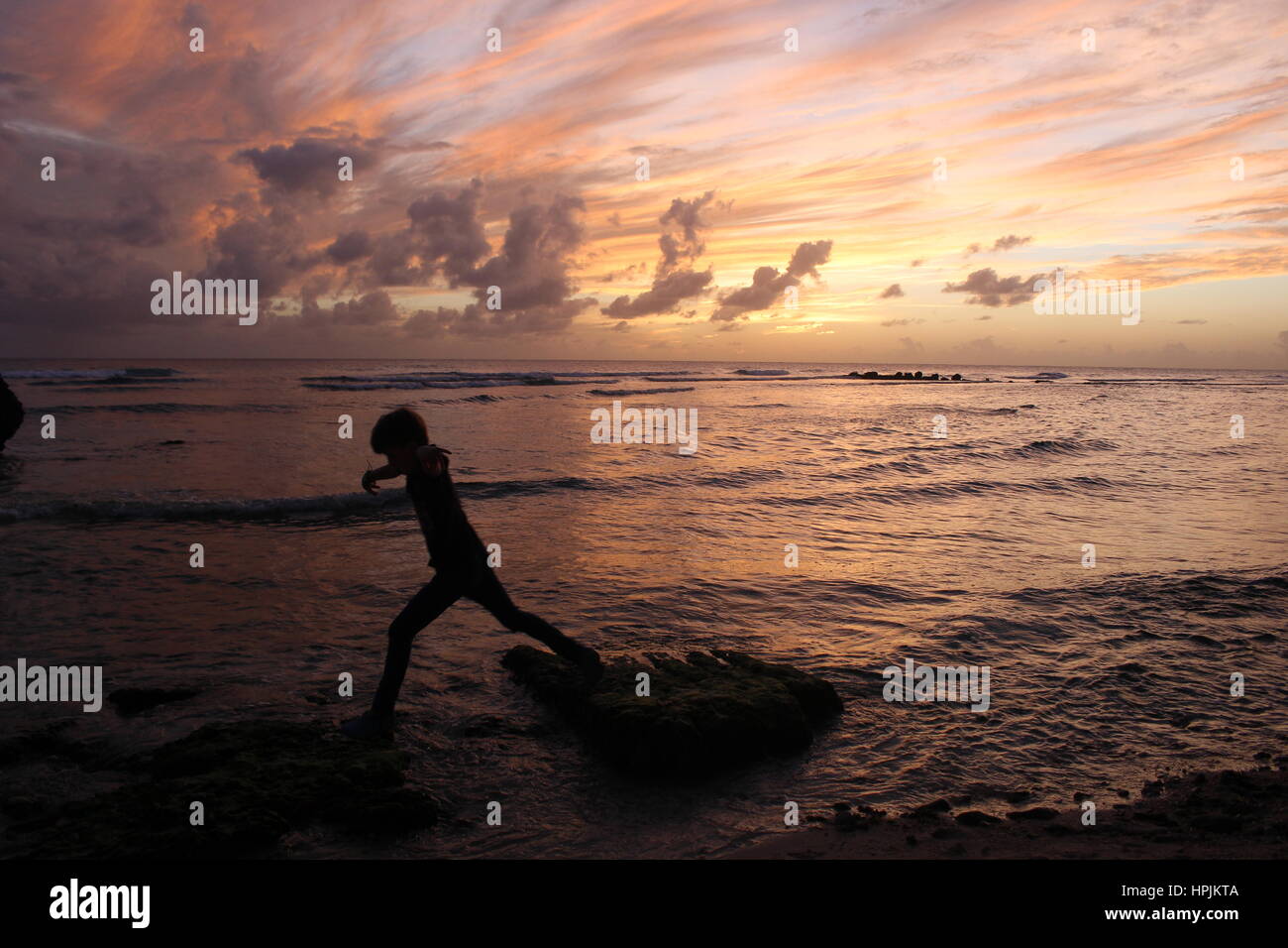 Jumping over rocks hi-res stock photography and images - Alamy