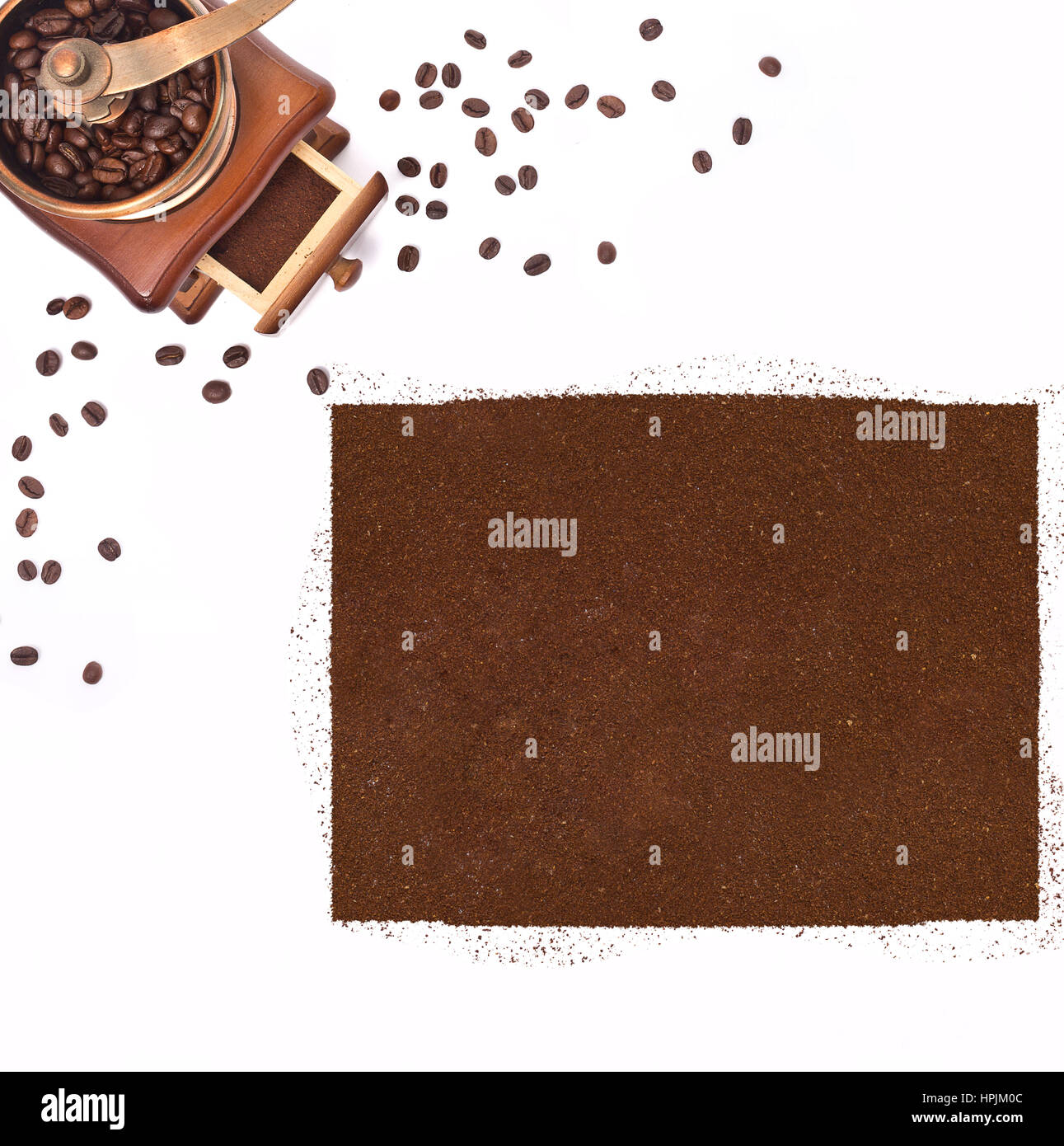 Coffee powder in the shape of Colorado and a decorative coffee mill ...