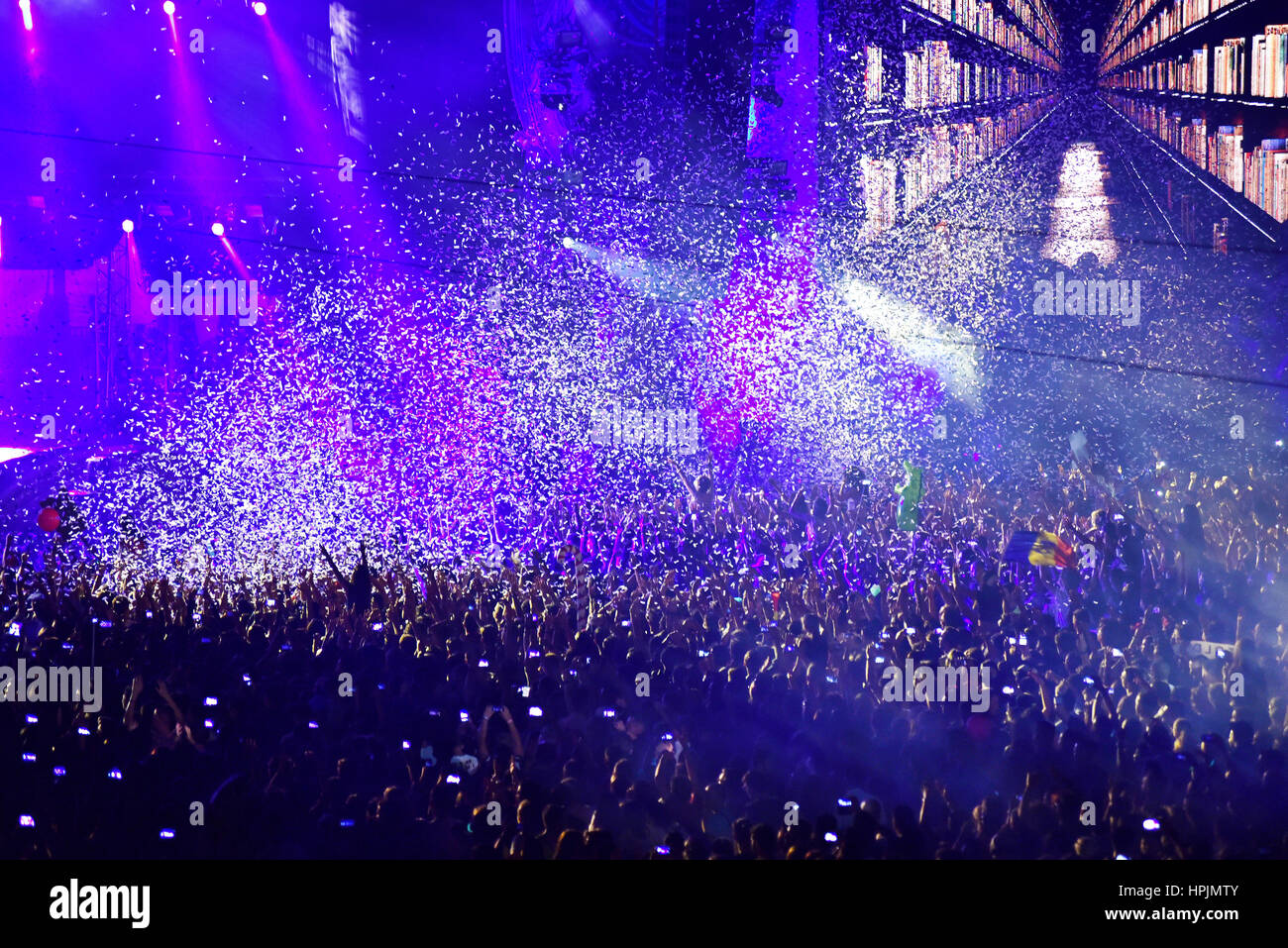 CLUJ-NAPOCA, ROMANIA - AUGUST 7, 2016: Confetti cannons throwing confetti from the stage over ...