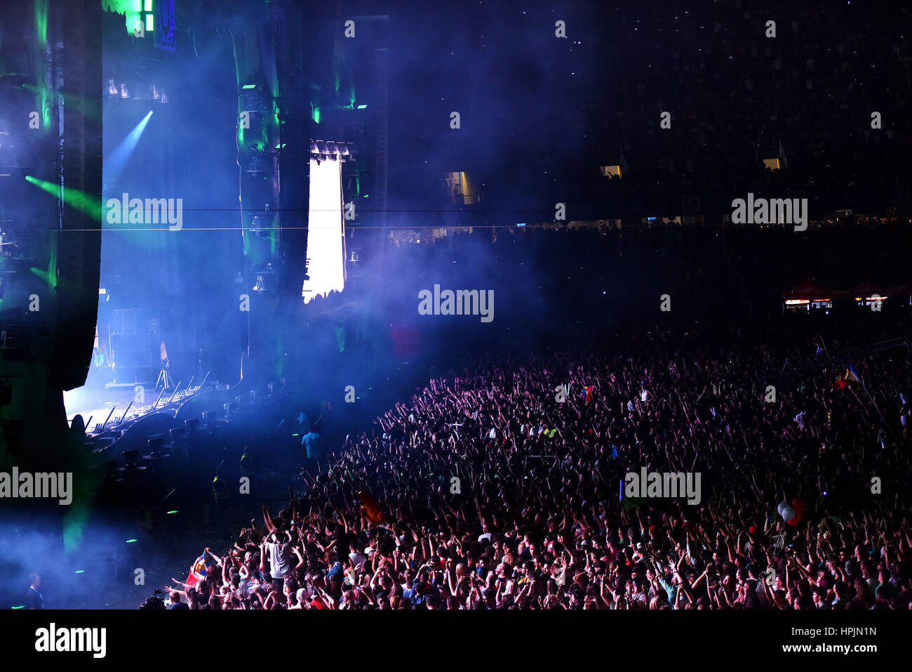 CLUJ NAPOCA, ROMANIA - AUGUST 7, 2016: Crowd of people having fun and dancing during a Dj W&W ...