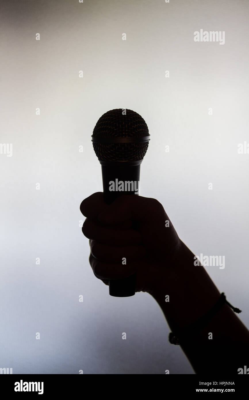 Hand Holding A Microphone High Resolution Stock Photography and Images ...