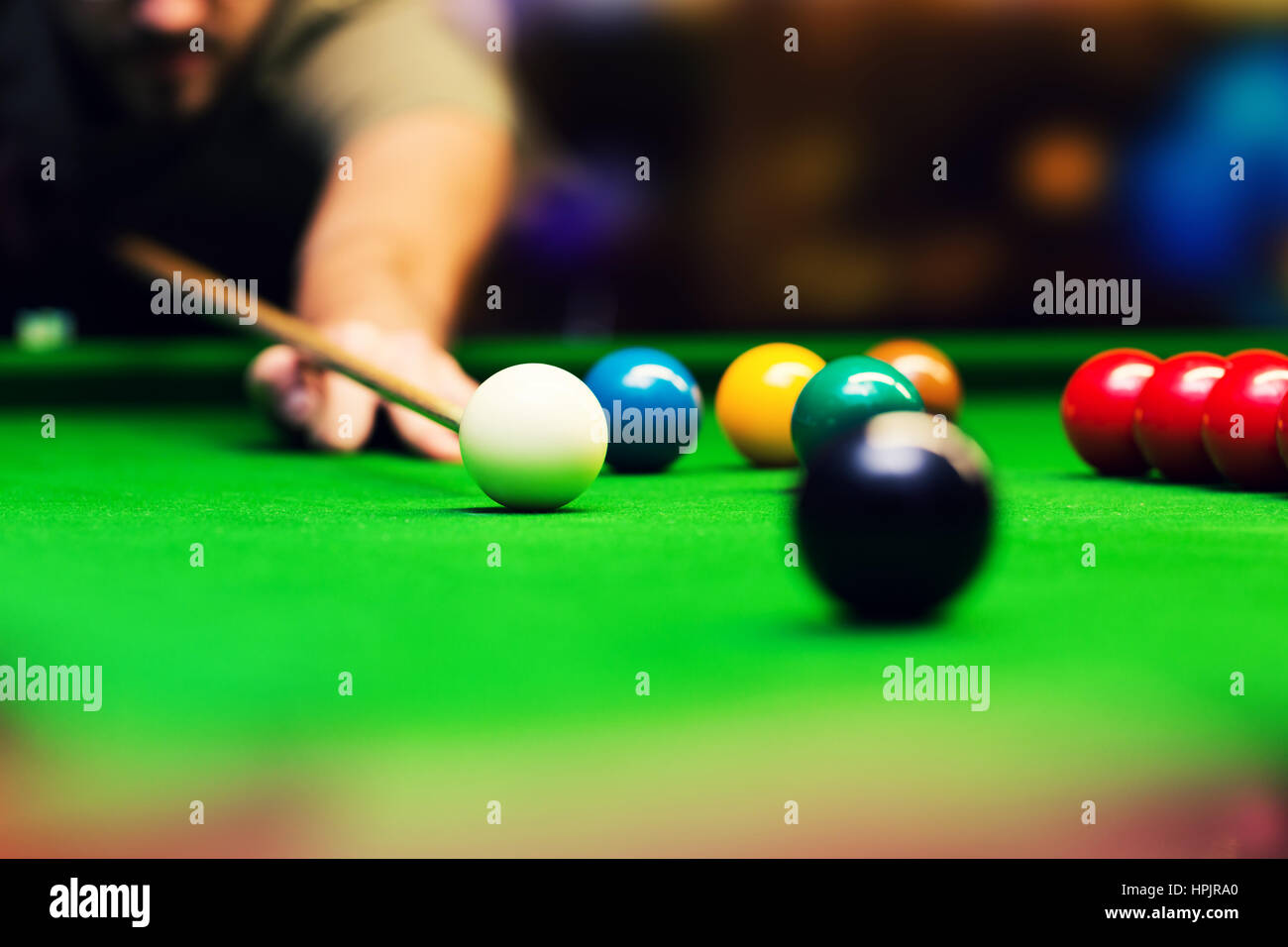 playing snooker - man aiming the cue ball Stock Photo - Alamy