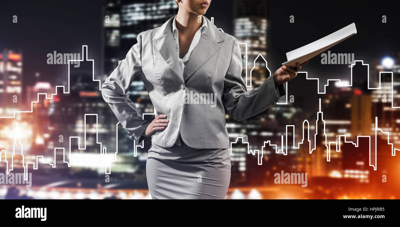 Woman architect or engineer presenting construction concept and Stock ...