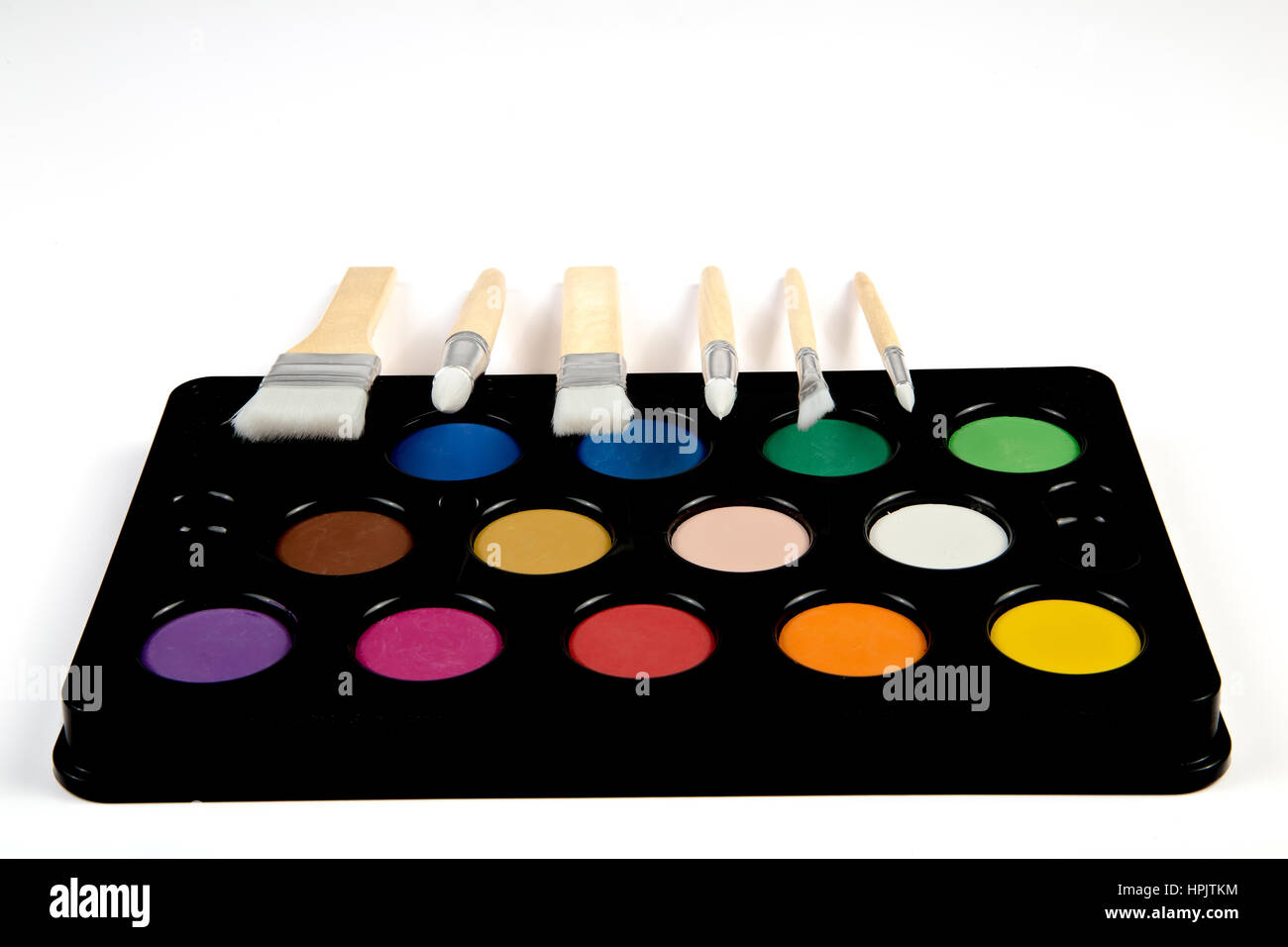 White paintbrushes with wooden handle and color paint isolated Stock ...