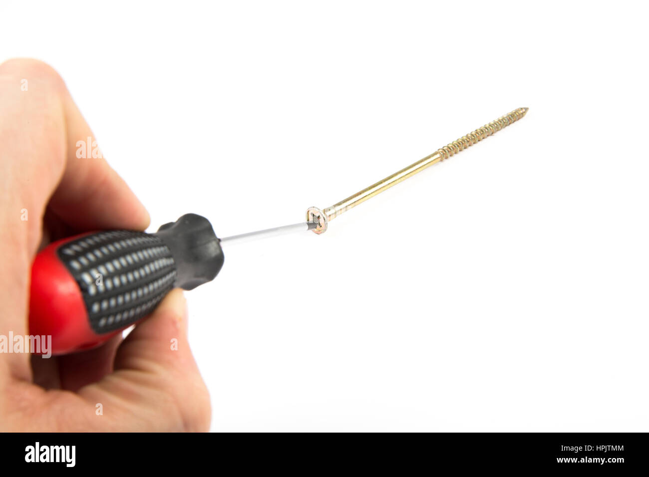 Hand is screwing a screw on white background isolated Stock Photo - Alamy