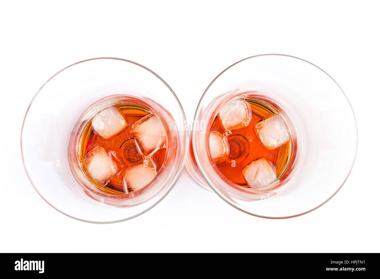 two alcohol drinks with ice view from top Stock Photo - Alamy