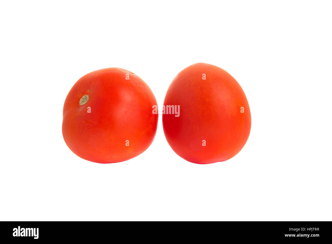 Two red tasty isolated tomatoes on white background Stock Photo - Alamy