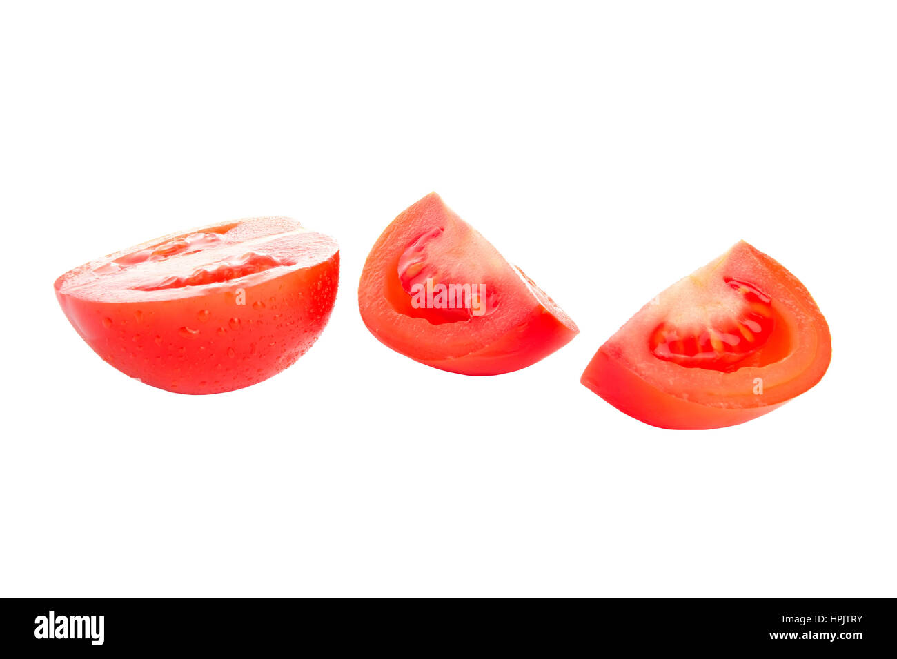 Red sliced tasty isolated tomatoes on white background Stock Photo - Alamy