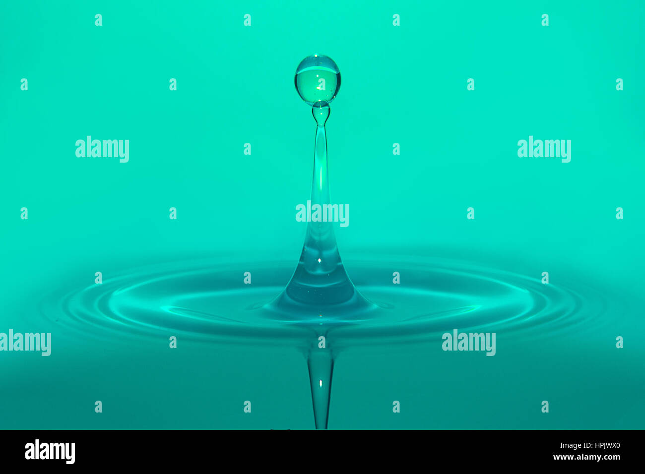 Water droplets splashing cyan background, great for spa use Stock Photo ...