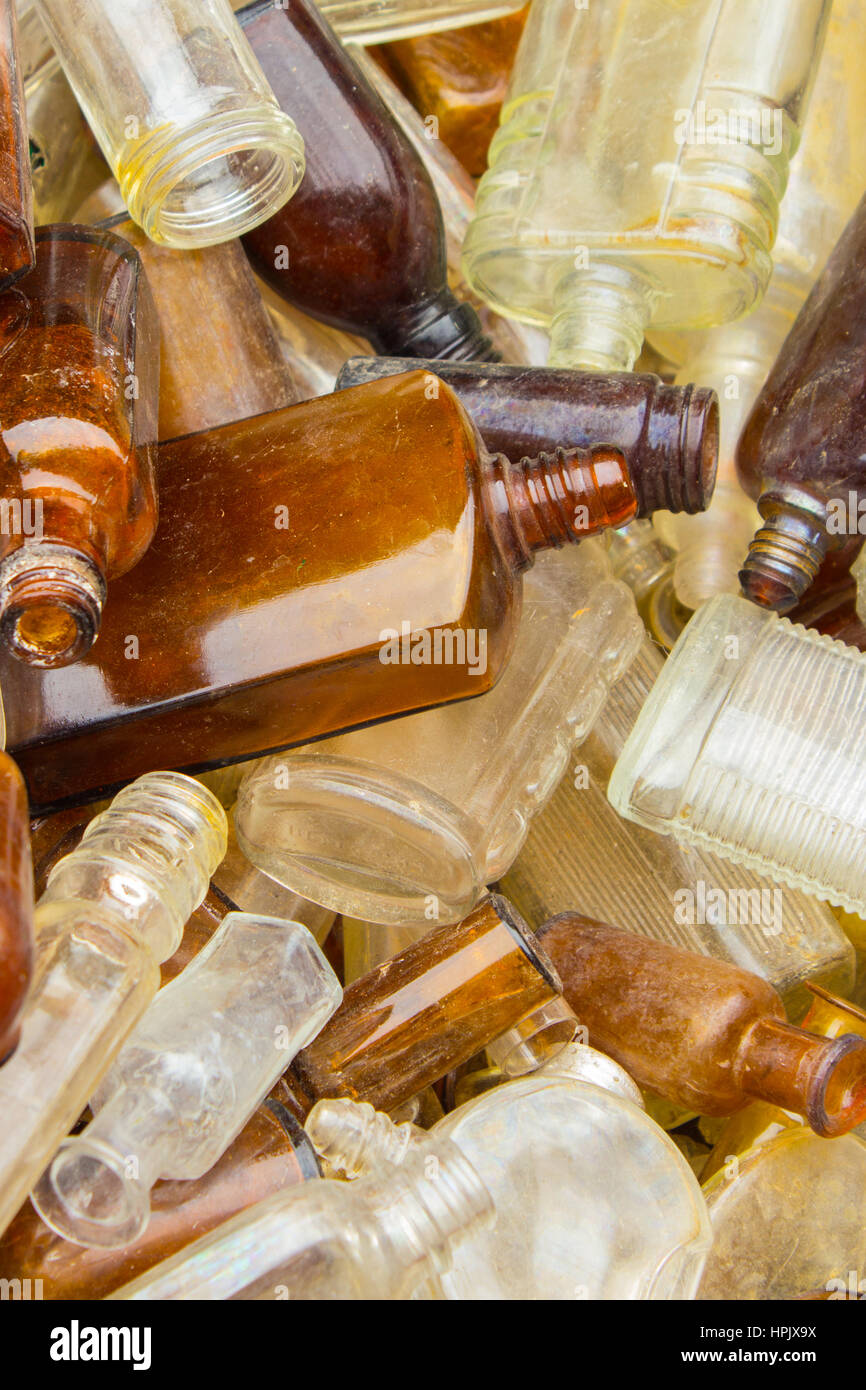 Heap of antique old dirty bottles for sale on stall at the bazaar as ...