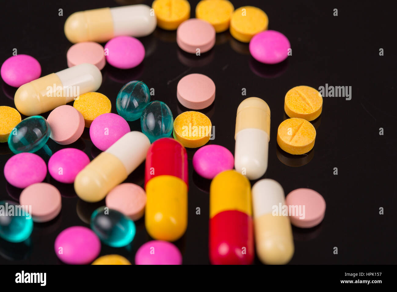 different tablets pills capsule heap mix therapy drugs Stock Photo - Alamy