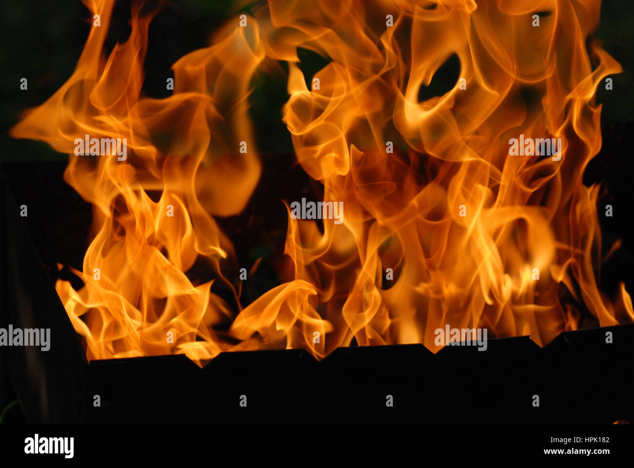 fire flames for background. Camping vacation food cooking Stock Photo ...