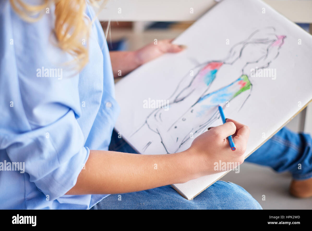 Woman is drawing more sketches Stock Photo - Alamy