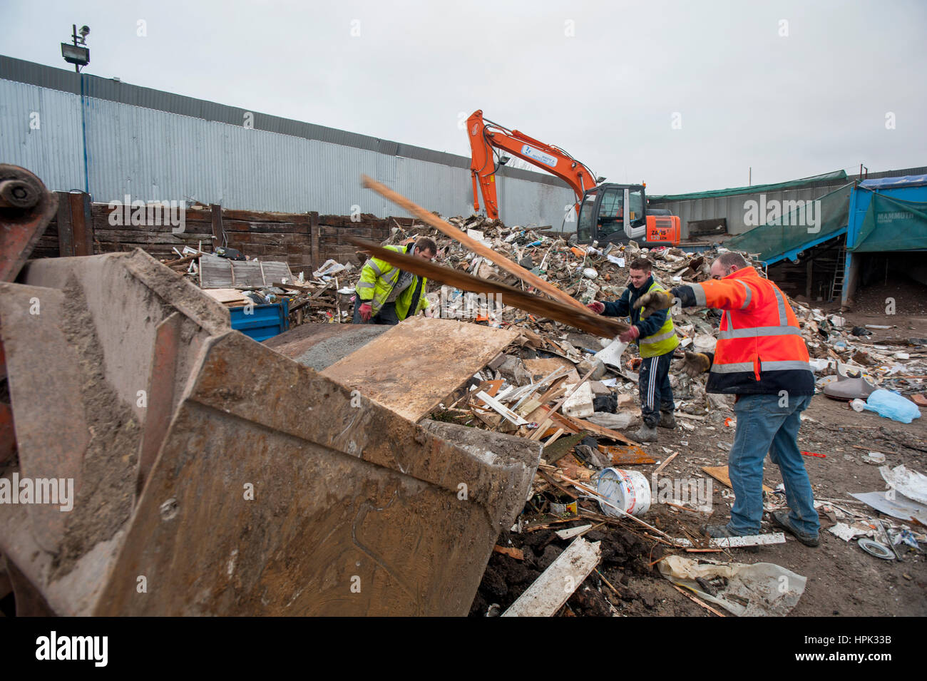 Workers sorting waste material to recycle materials Stock Photo - Alamy