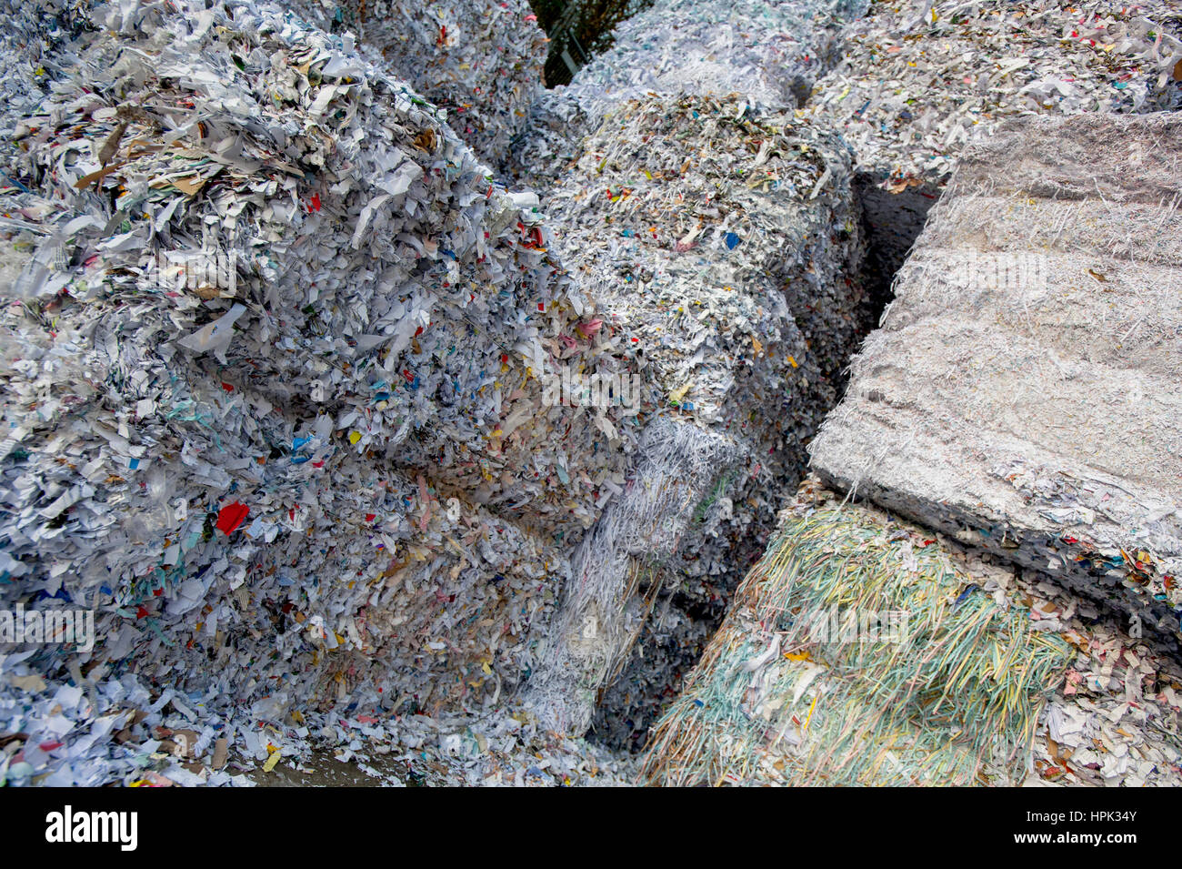 Bales of shredded paper at a recycling yard Stock Photo - Alamy