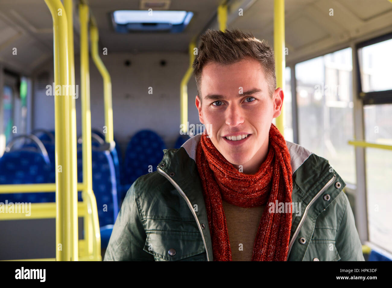 Man standing on a bus hi-res stock photography and images - Alamy