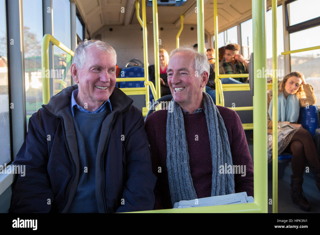 Pensioners laughing on bus hi-res stock photography and images - Alamy