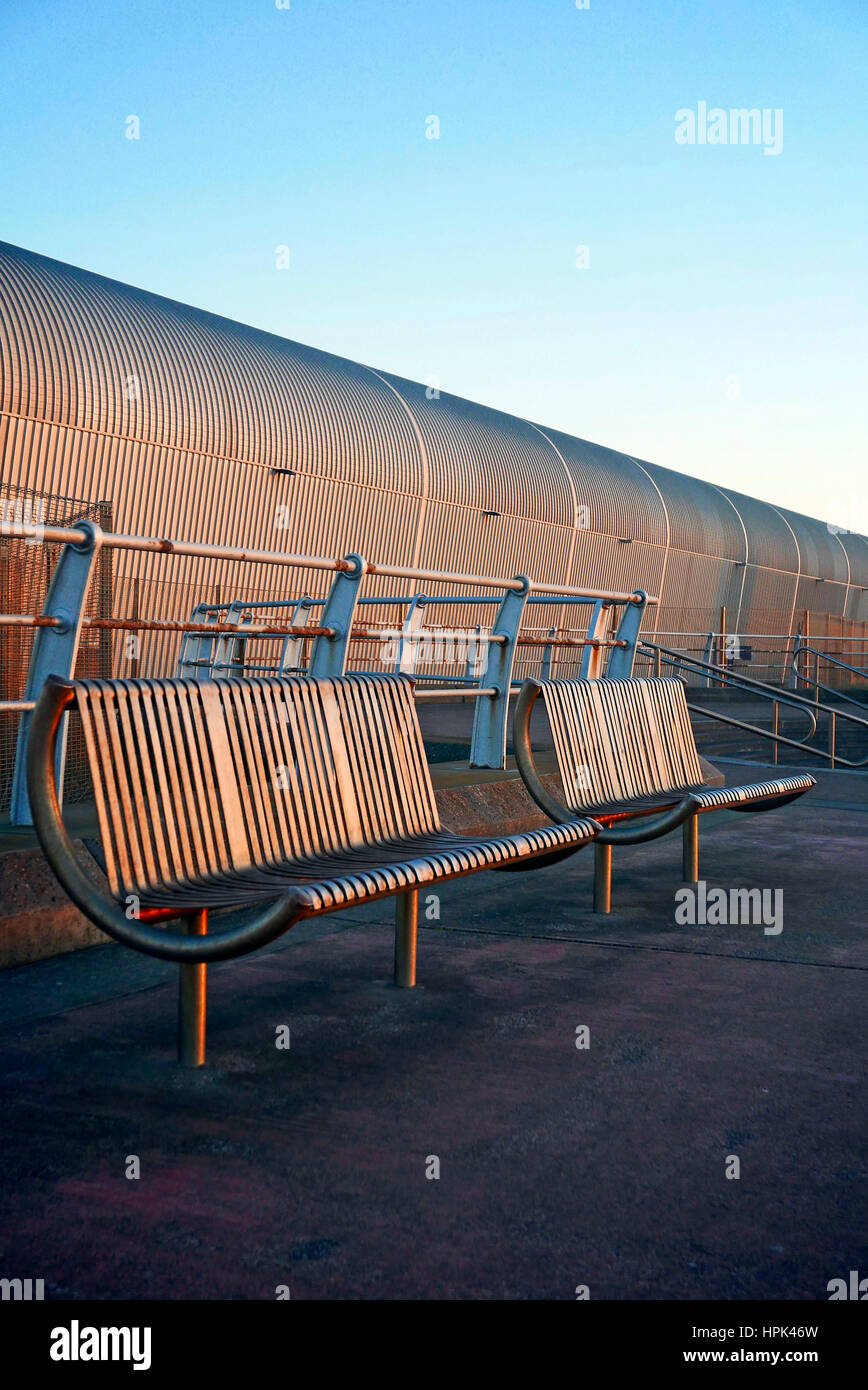 Steel benches and building Stock Photo - Alamy