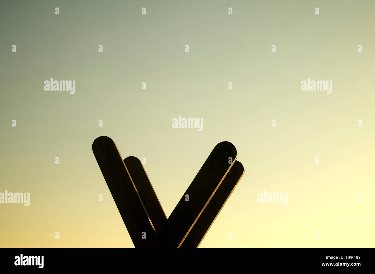 V shaped wooden slats against evening sky Stock Photo - Alamy