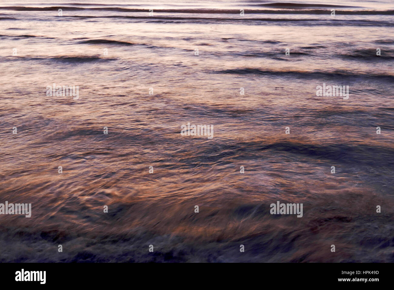 Tidal movement at dusk Stock Photo - Alamy