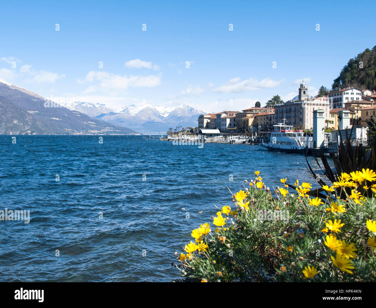 Bellagio lake of Como, Italy - April 1, 2015: Dock of Bellagio with ...