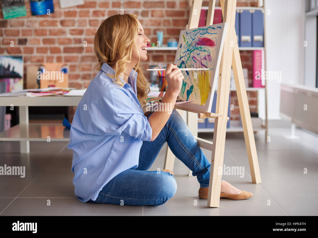 Side view cheerful artist hi-res stock photography and images - Alamy