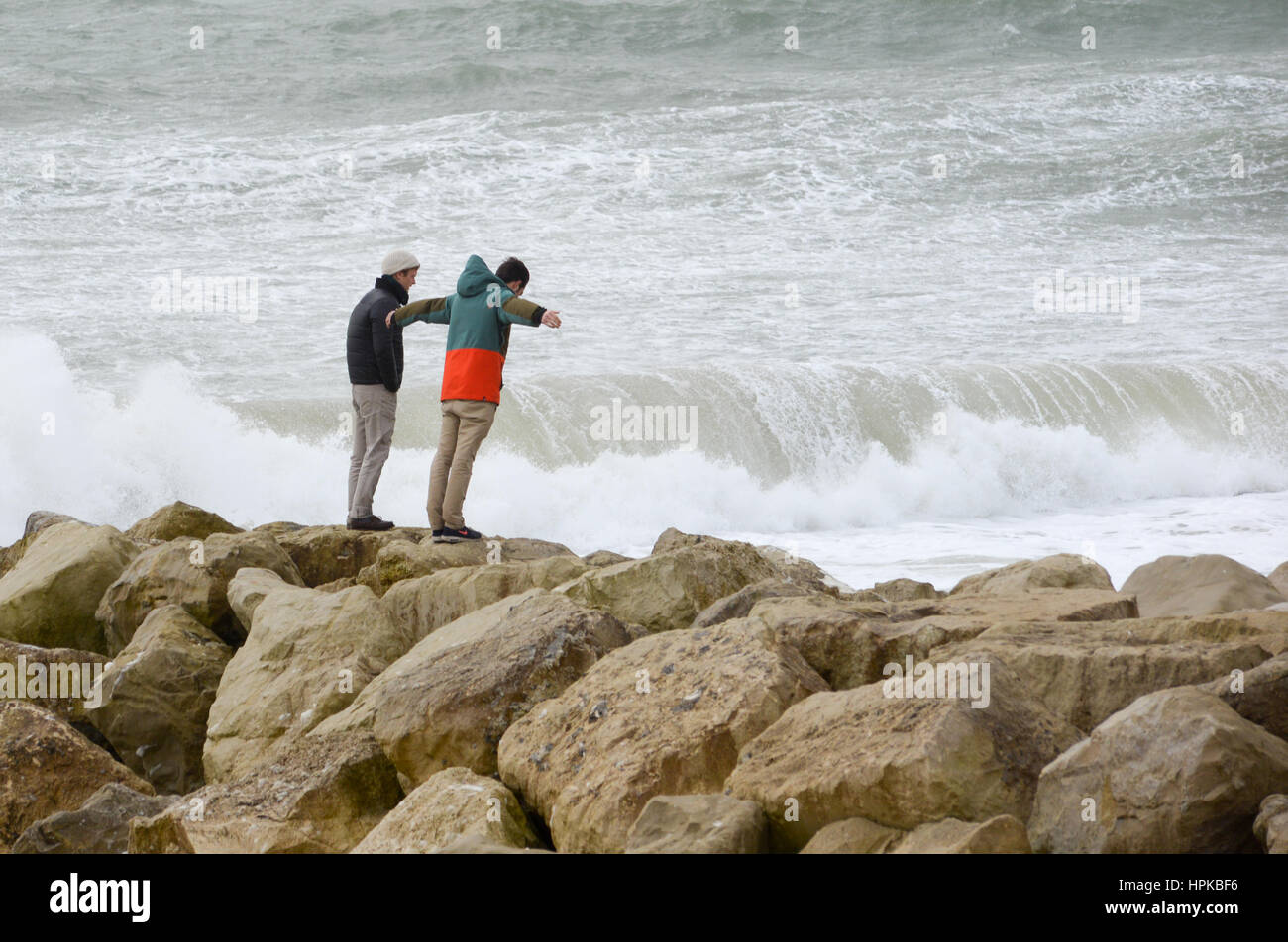 Leaning into strong wind in Storm Doris with rough sea, Hengistbury ...